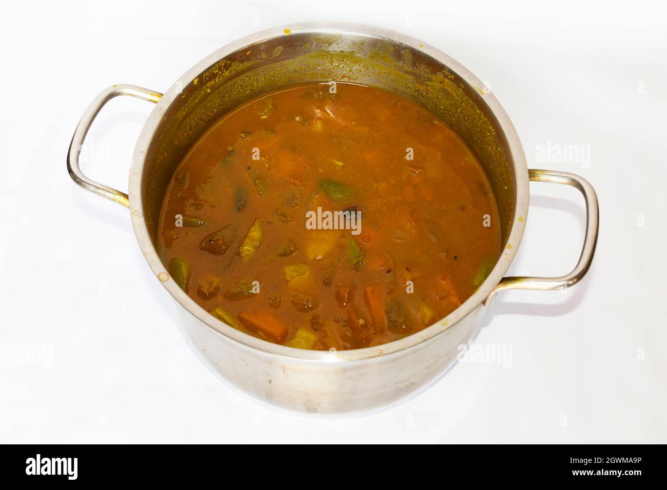 Special Kerala Style Sambar Curry In Steel Utensil.Background White And ...