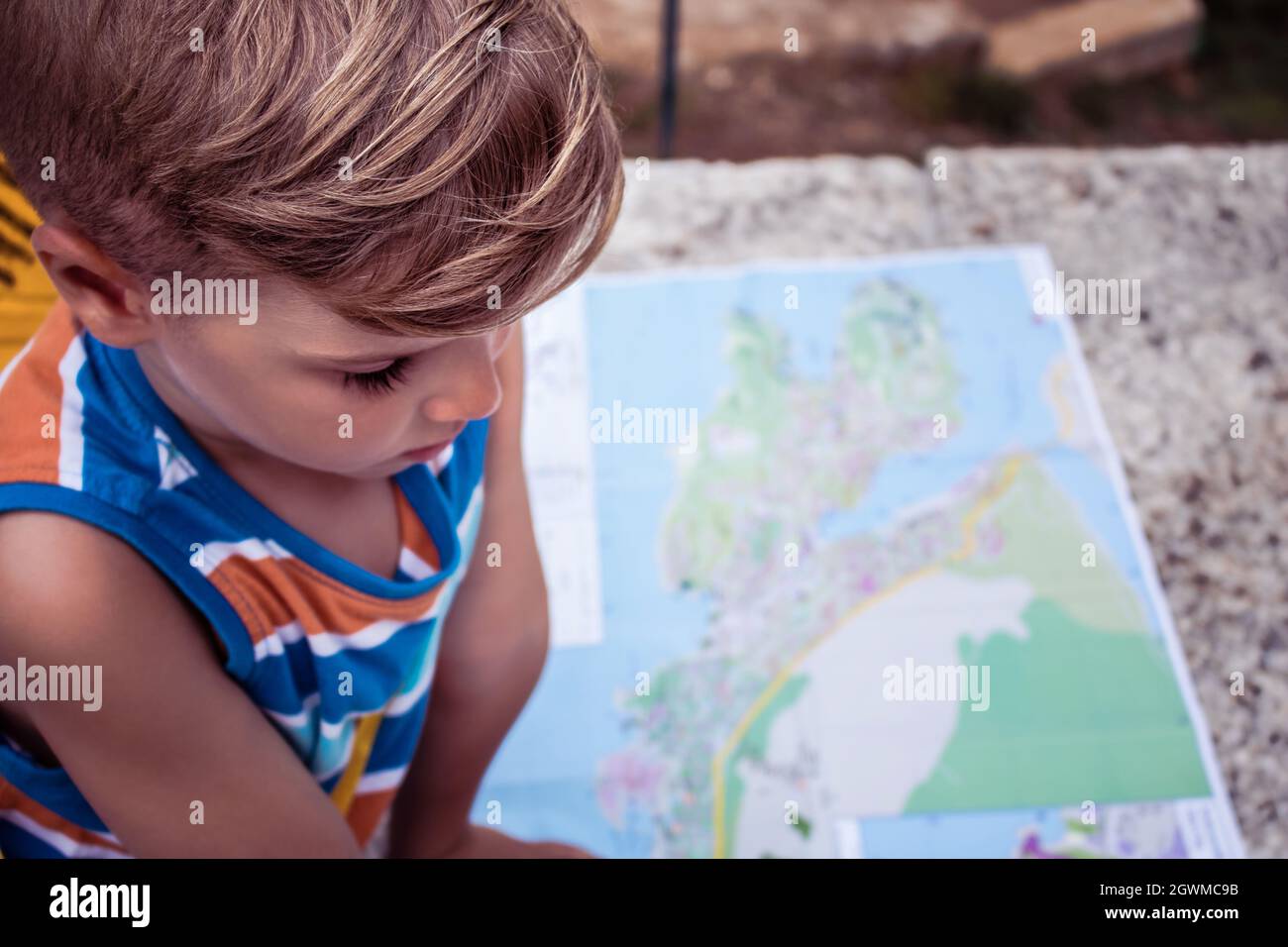 Boys exploring nature map hi-res stock photography and images - Alamy