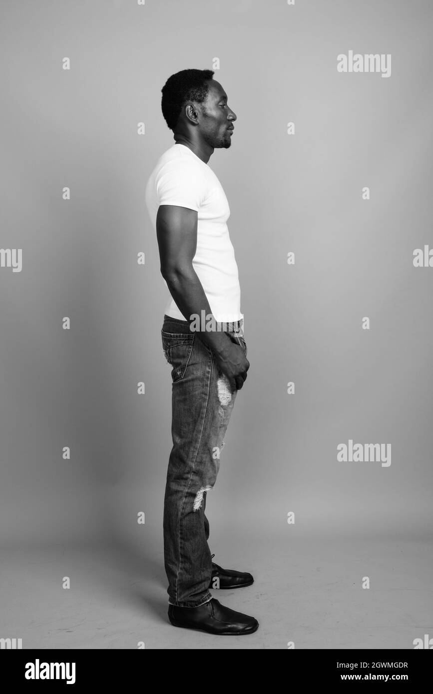 Rear full body view man standing Black and White Stock Photos & Images ...