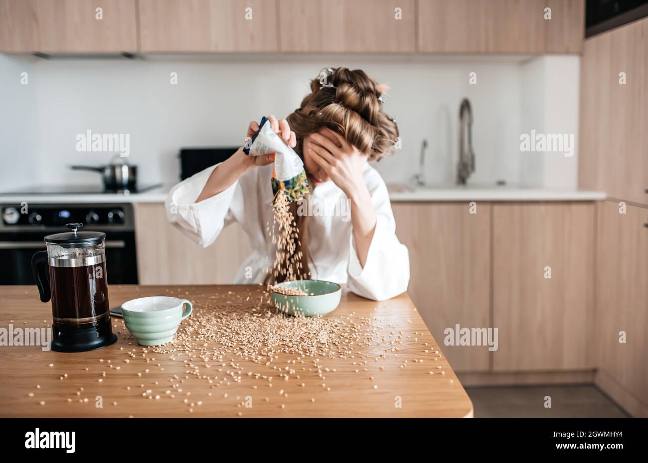 Woman pouring coffee on head hi-res stock photography and images - Alamy