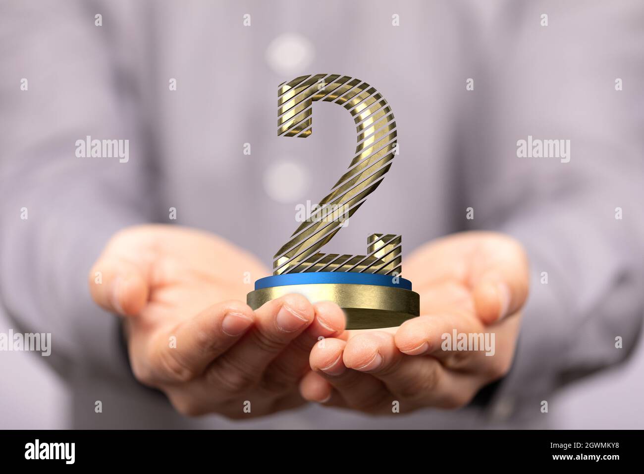 A person presenting a 3D rendered projection of a second-place award ...