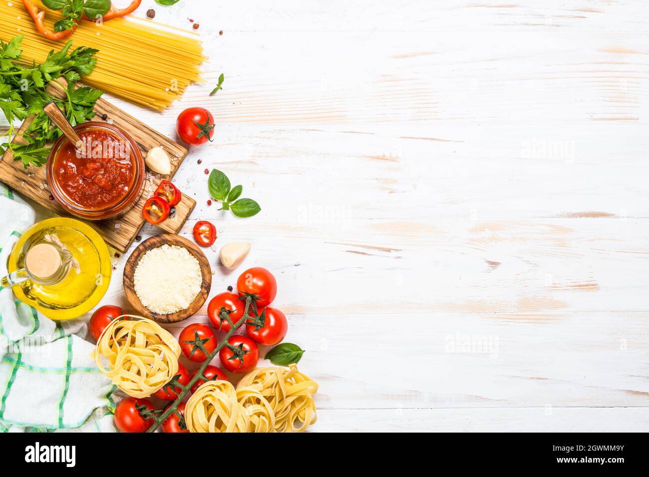 Italian food background at white bkitchen table Stock Photo - Alamy