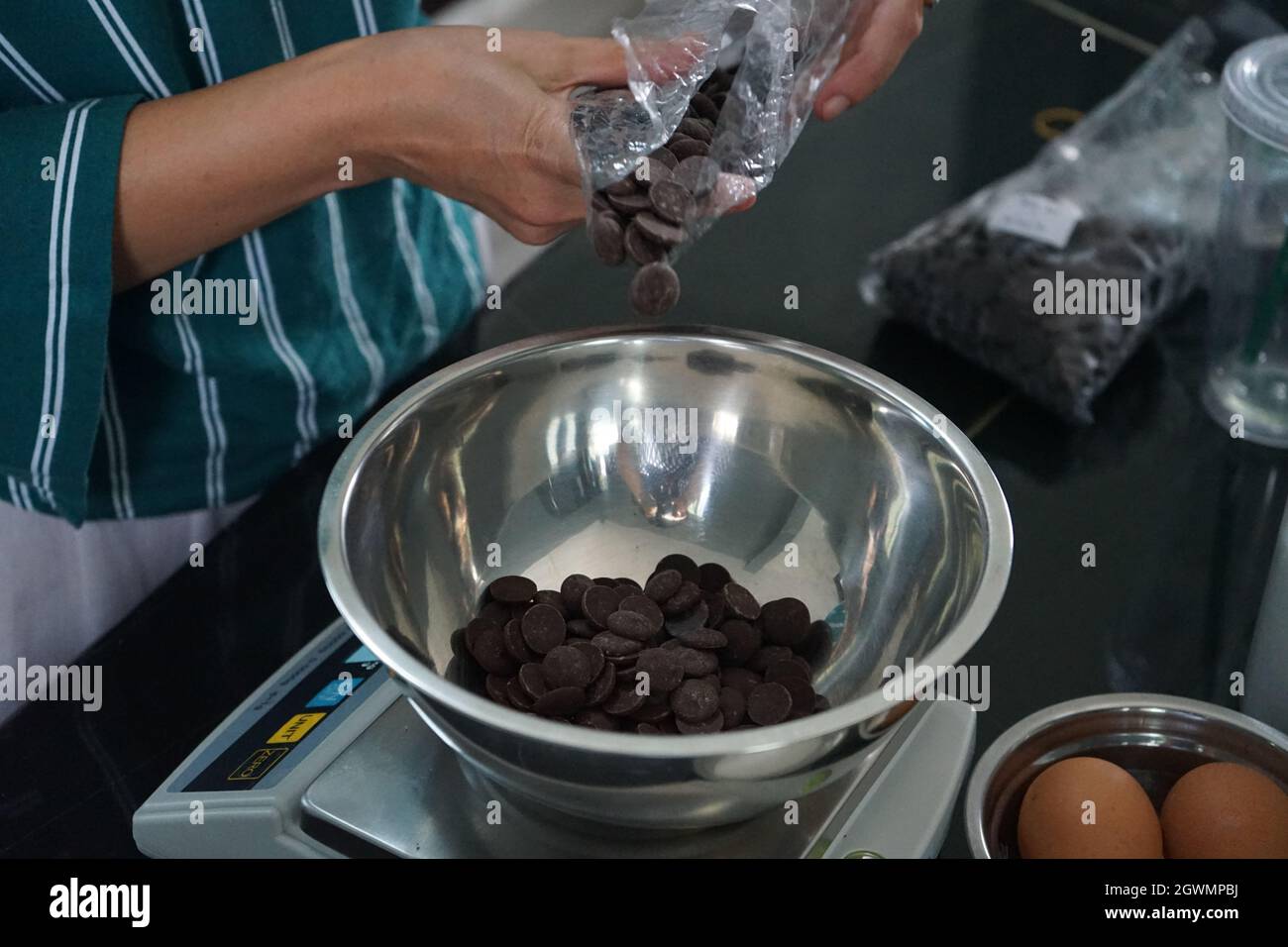 Weighing scale with chocolate hi-res stock photography and images - Alamy