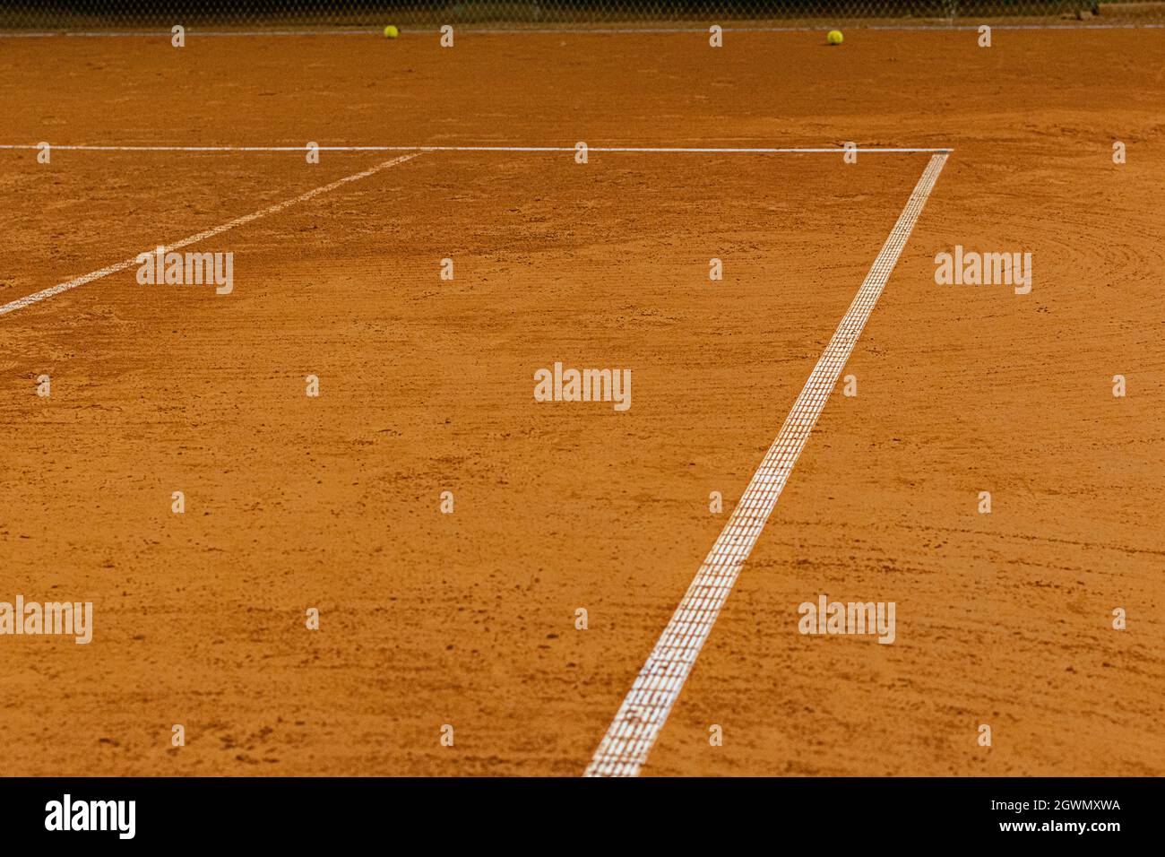 Corner of the ground tennis court with white lines indoors Stock Photo ...