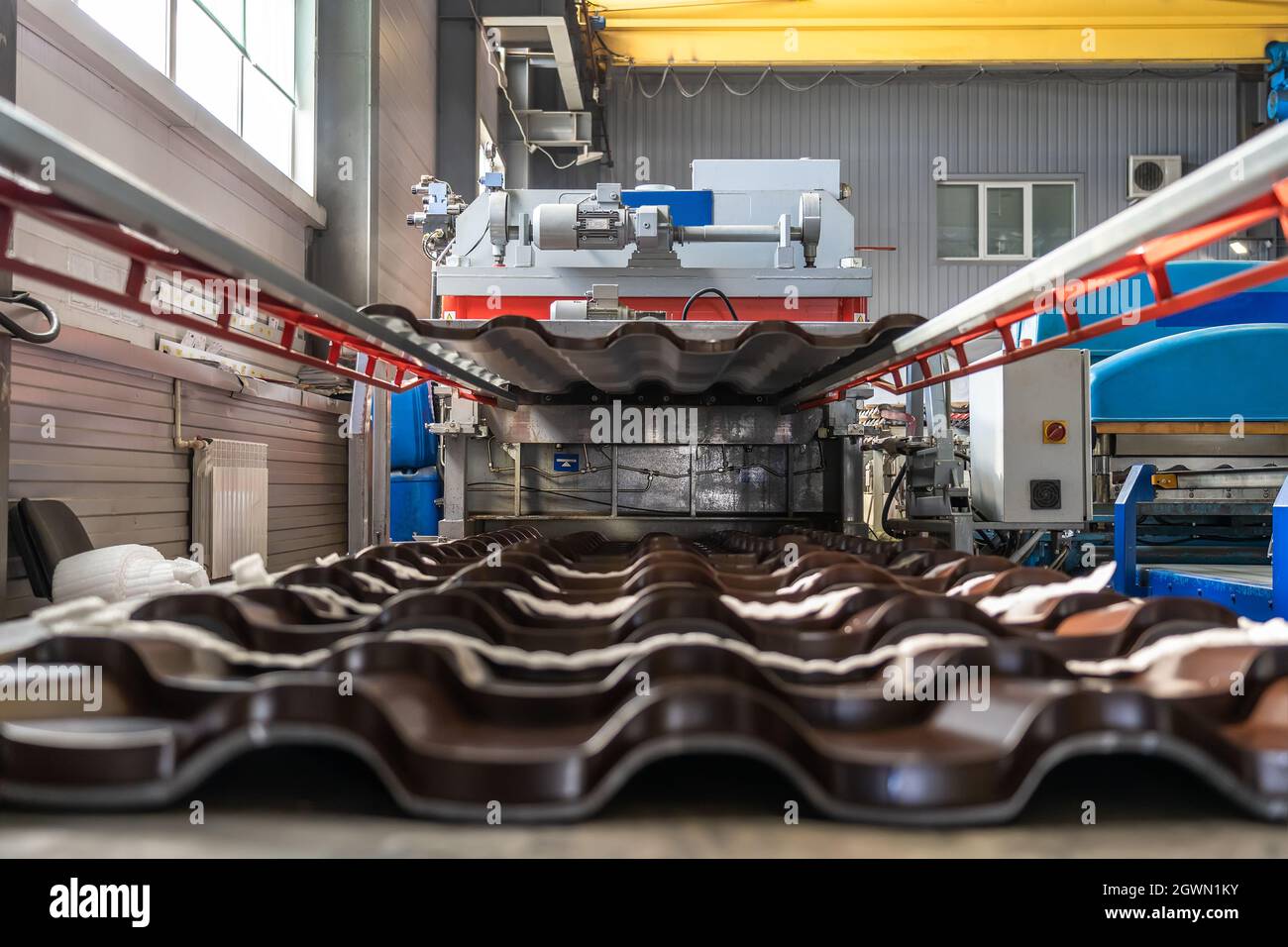 Metal sheet forming machine in factory for production materials for ...