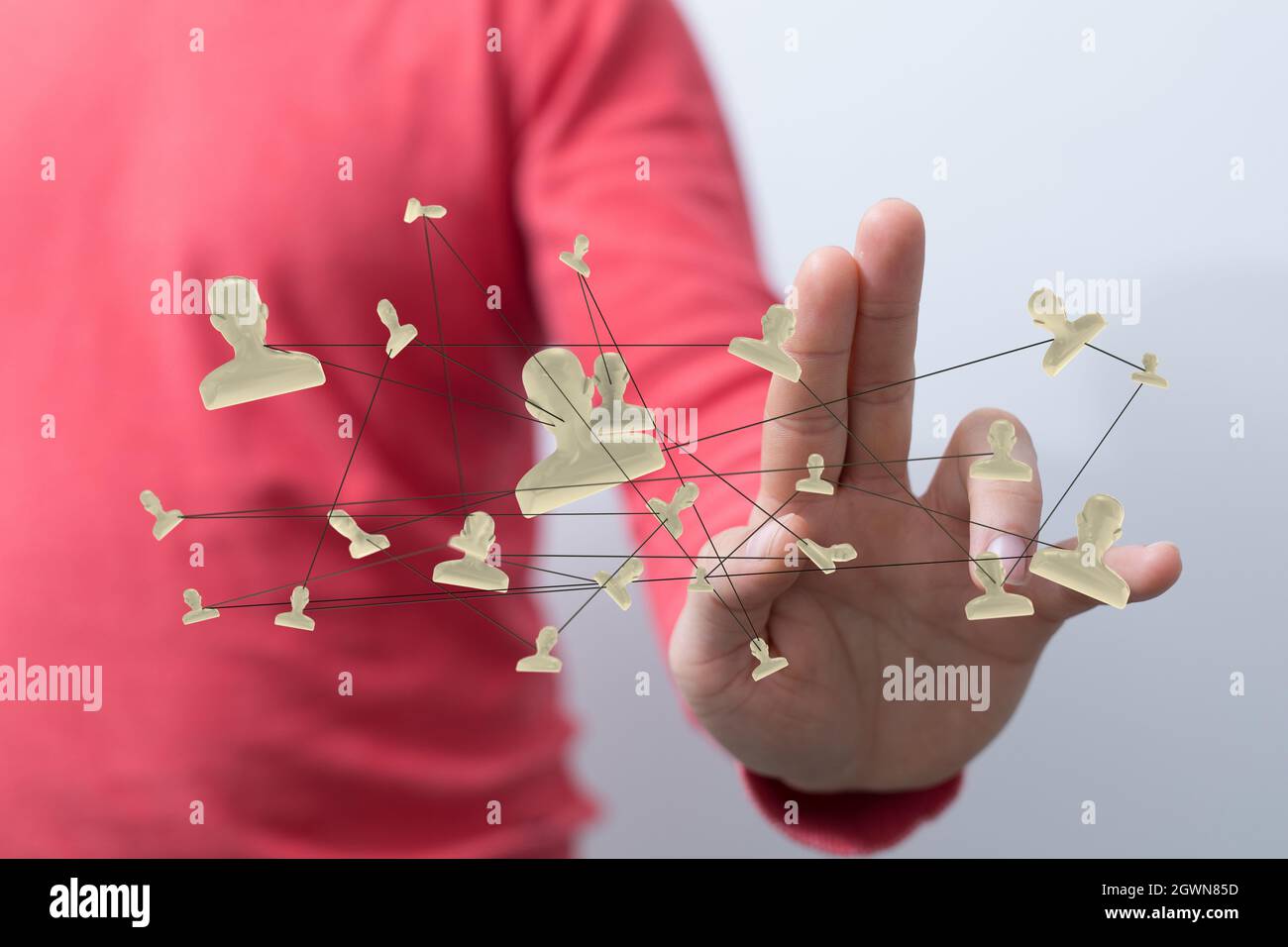 A person presenting a 3D rendered projection of network and human ...