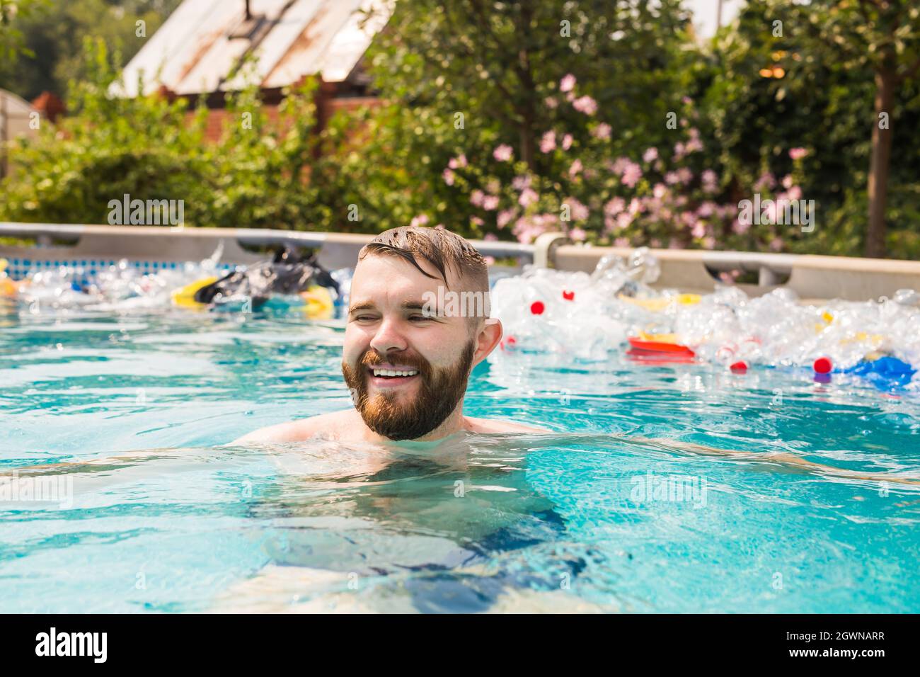 Old man swimming floating in hi-res stock photography and images - Alamy