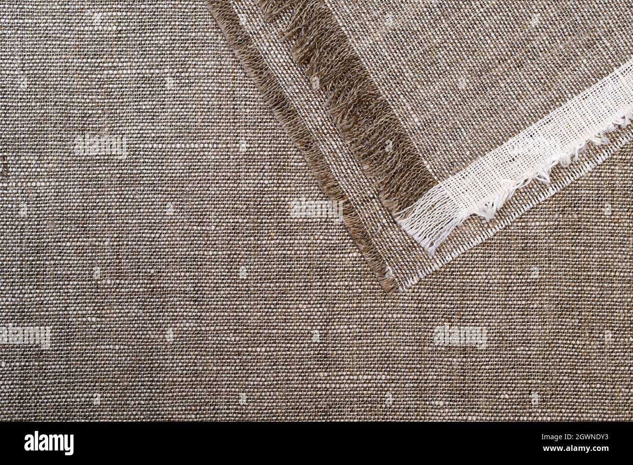 linen fabric surface and fabric edge closeup Stock Photo - Alamy