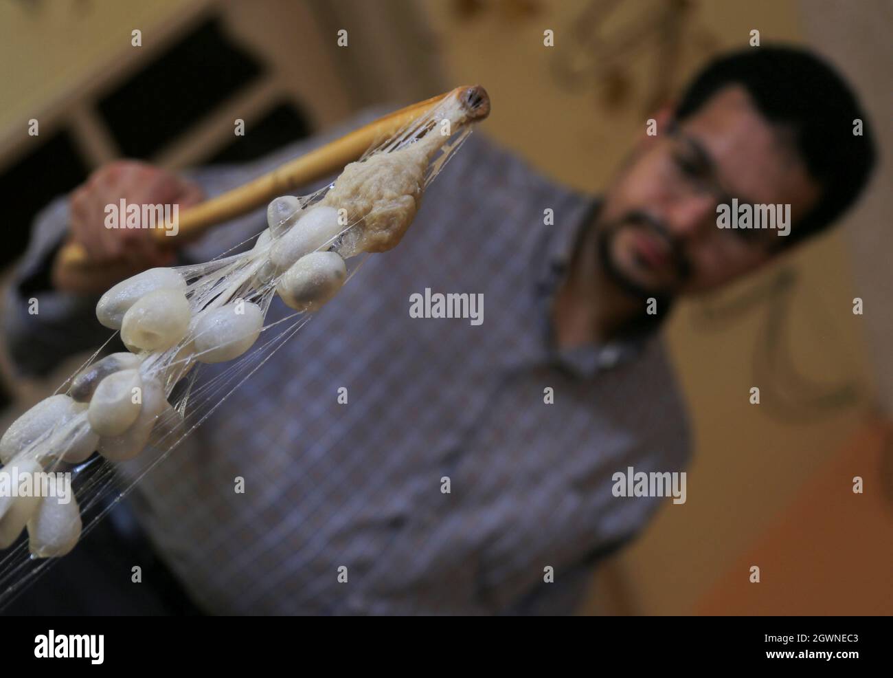 Reeling silk hi-res stock photography and images - Alamy