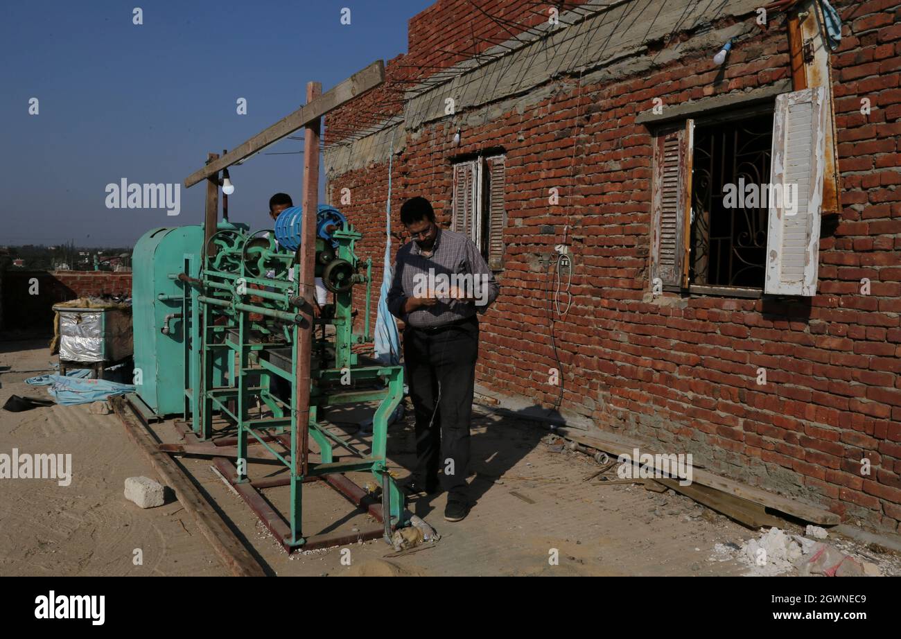 Reeling silk hi-res stock photography and images - Alamy