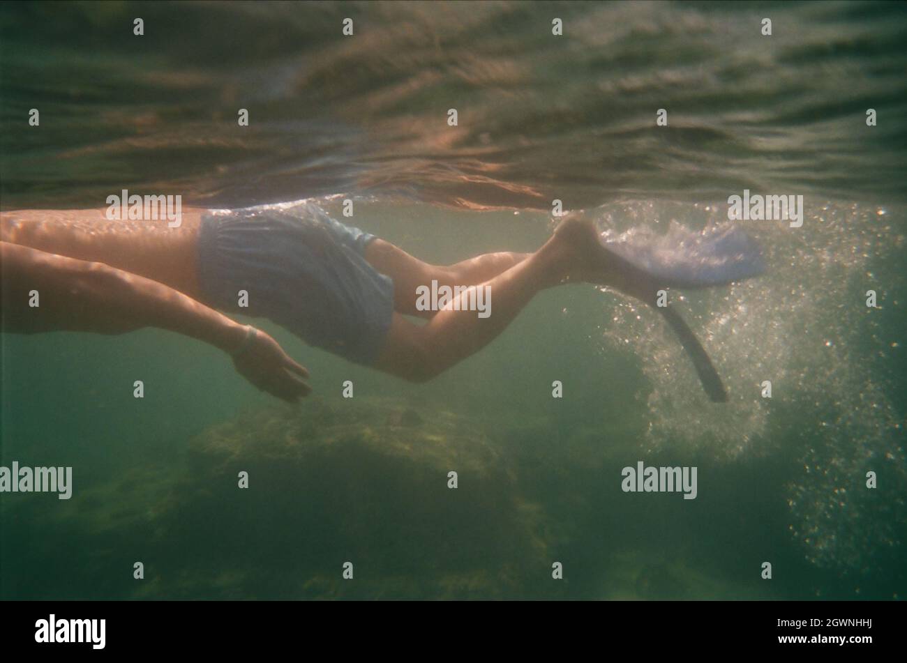 Man Swimming In Sea Stock Photo - Alamy