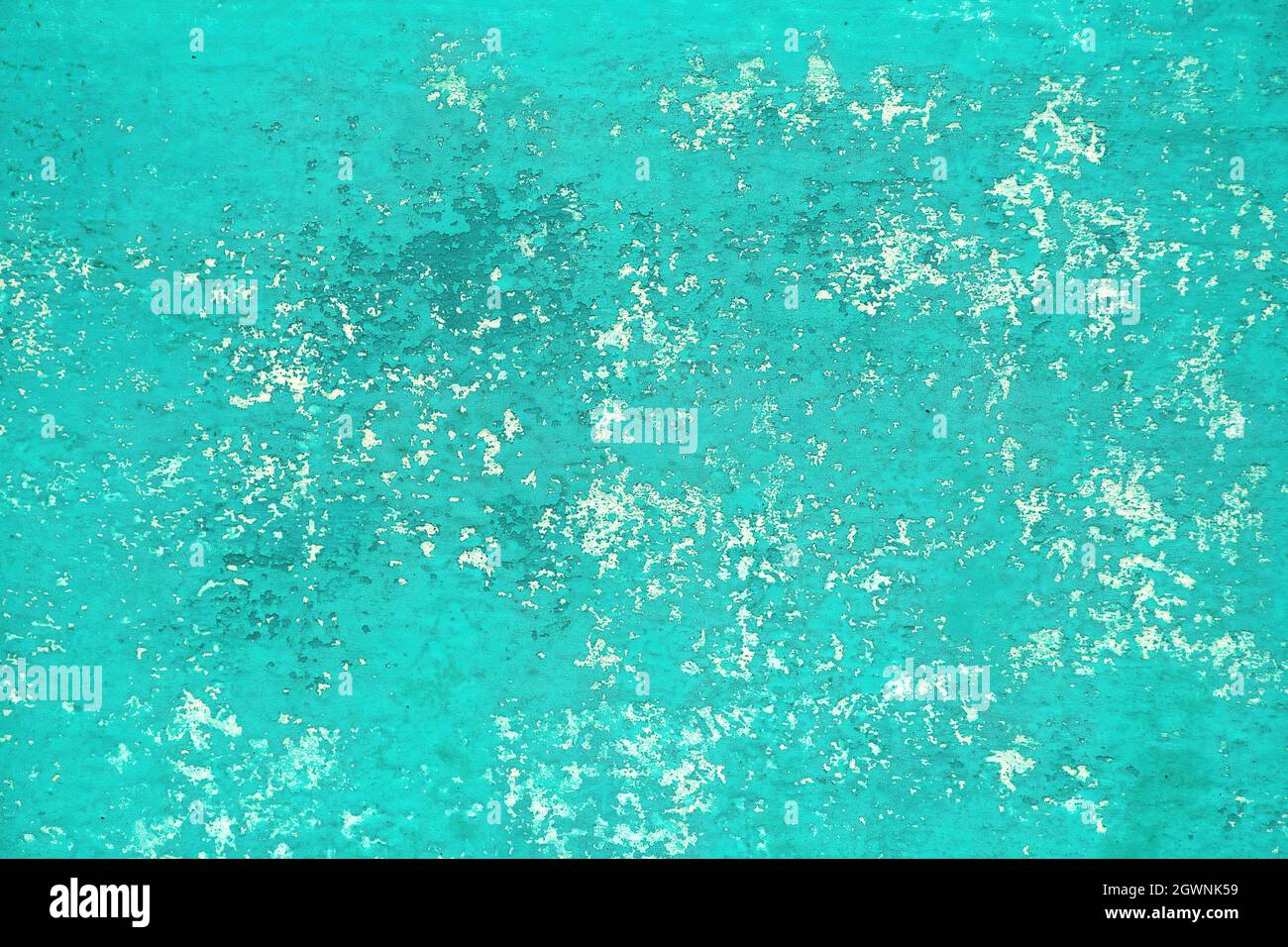 Turquoise distressed textured paint on a wall surface Stock Photo - Alamy