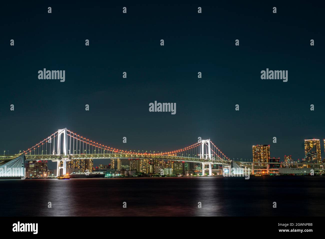 View Of Illuminated Tokyo Rainbow Bridge Over Tokyo Bay At Night Stock ...
