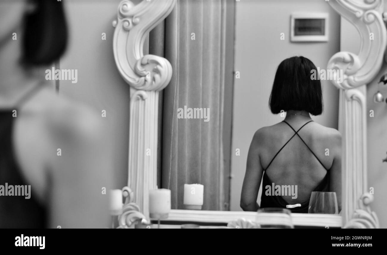 Woman rear view mirror Black and White Stock Photos & Images - Alamy