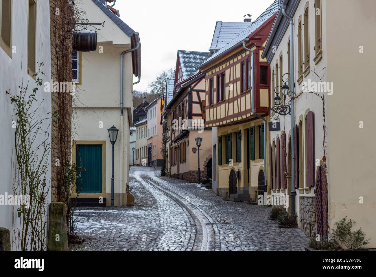 Narrow cobbled street in an old town with half timbered houses hi-res ...
