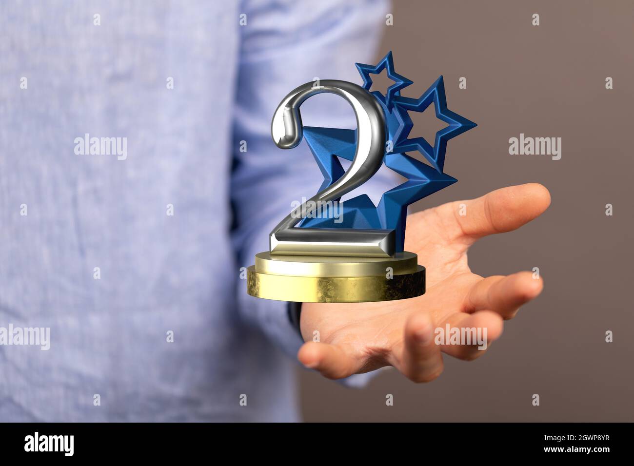 A person presenting a 3D rendered projection of a second-place award ...