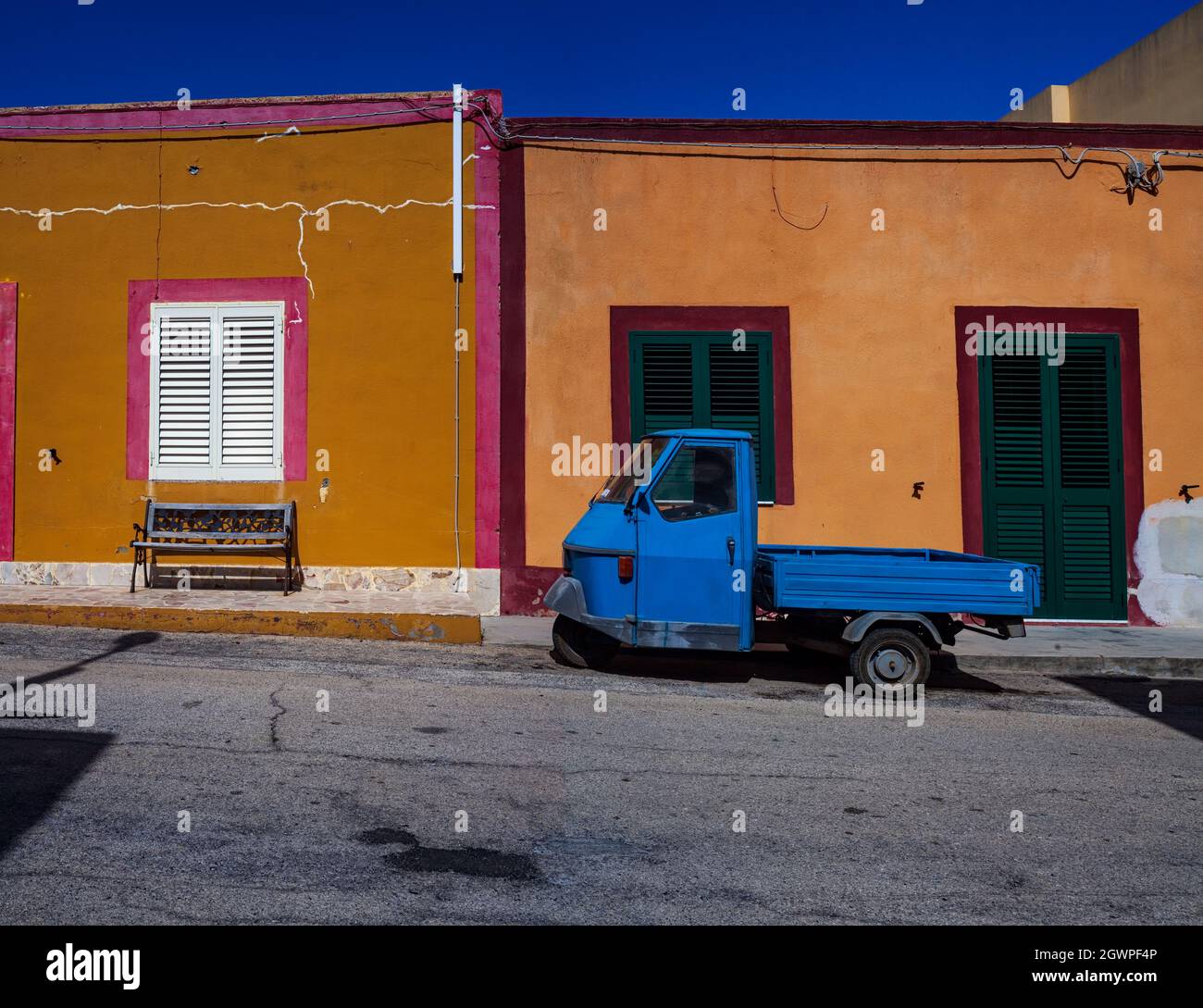 View of a typical italian Three-wheeler in the Linosa street. In the ...