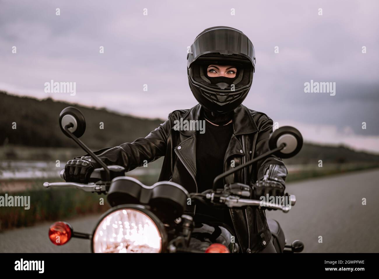 Biker riding motorcycle low angle hi-res stock photography and images ...