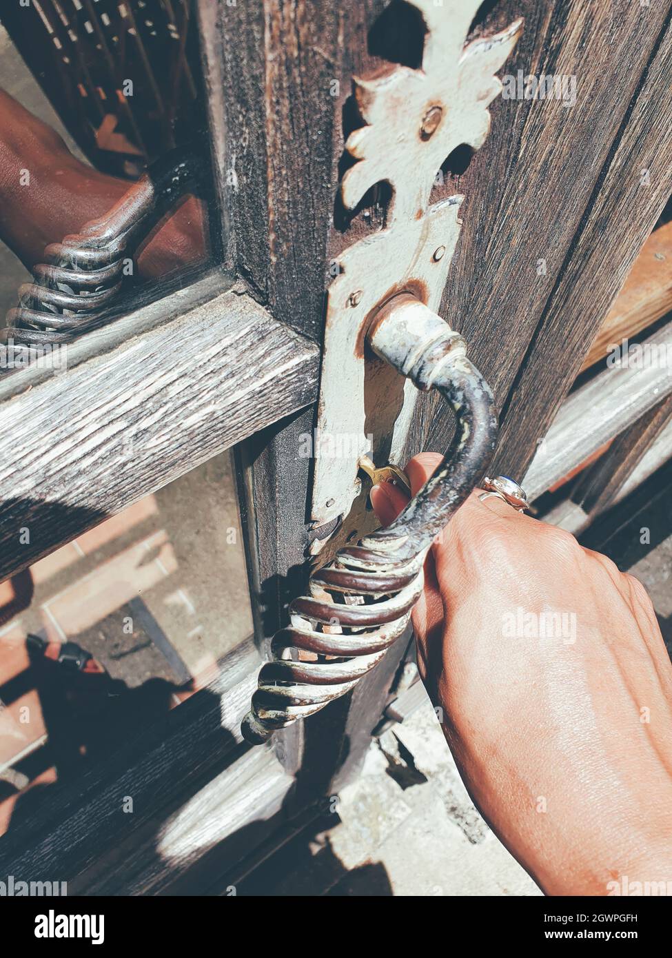 Woman locking building door hi-res stock photography and images - Alamy