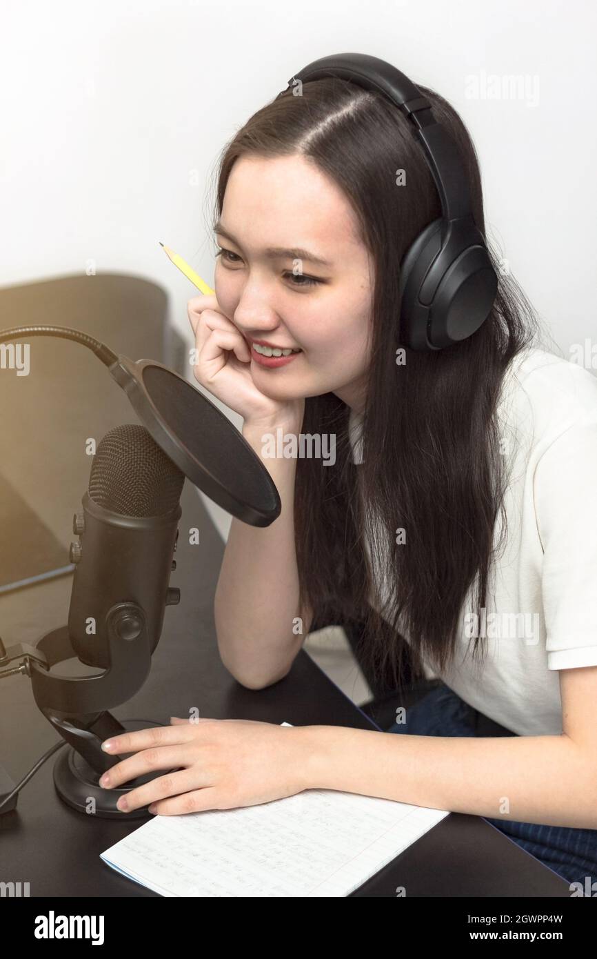 Commentator talking speaking into microphone hi-res stock photography ...