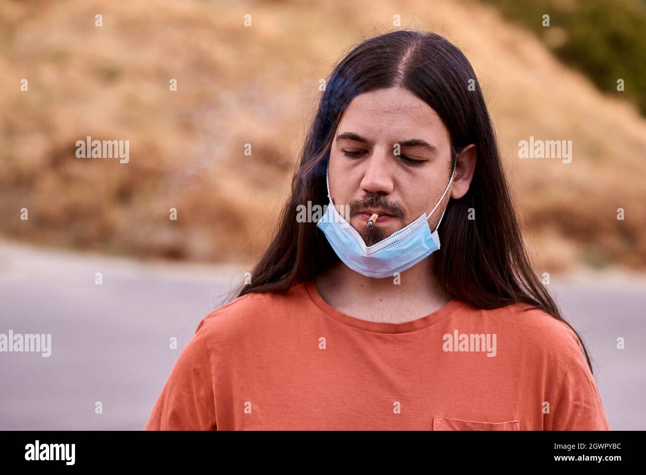 Boy smoking a cigarette hi-res stock photography and images - Alamy