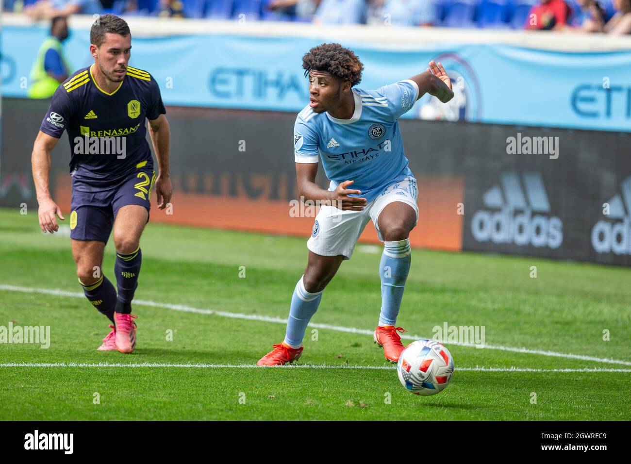 New York, USA. 03rd Oct, 2021. Tayvon Gray (24) of NYCFC controls the ...