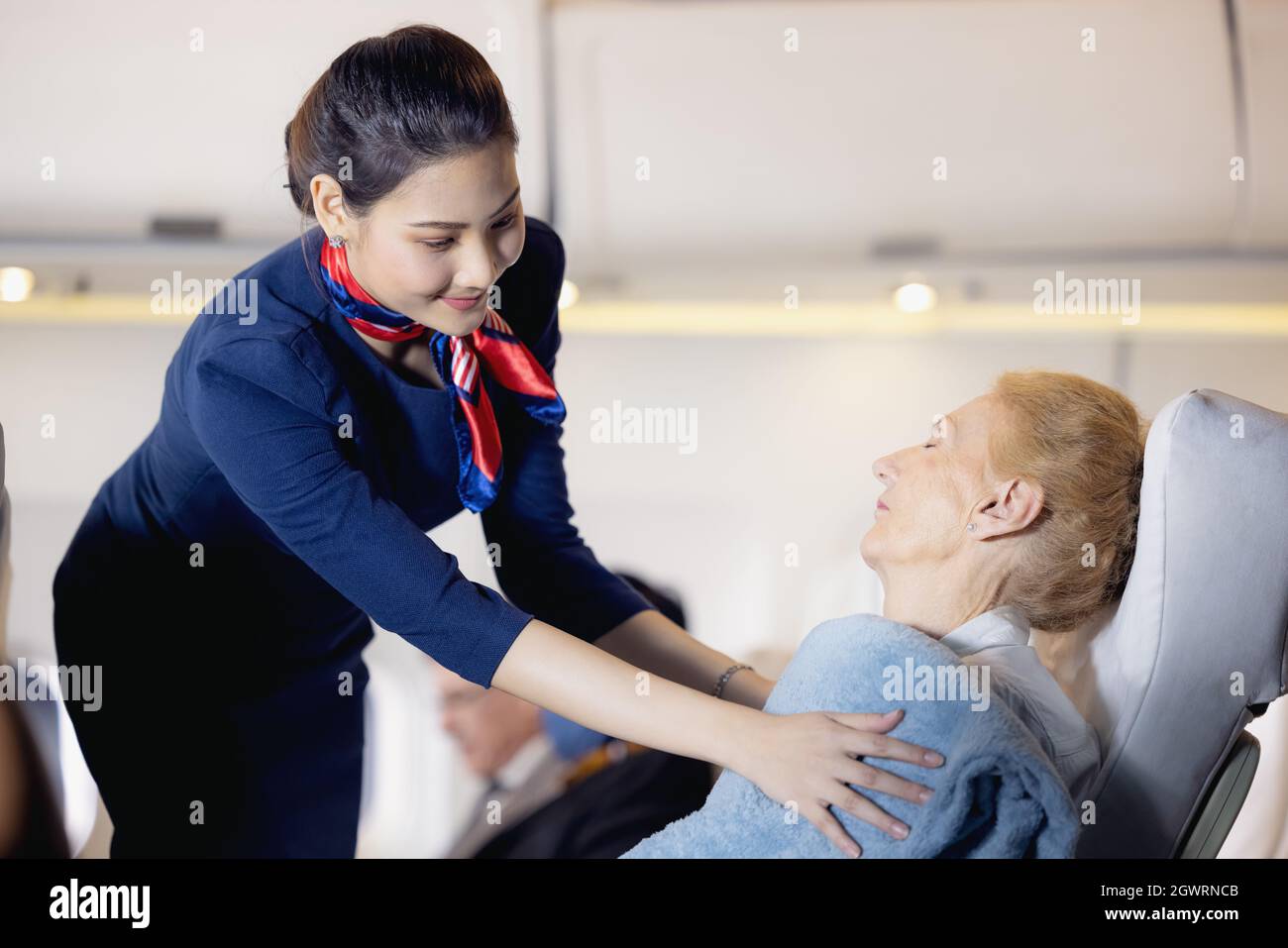 Boarding airplane elderly hi-res stock photography and images - Alamy