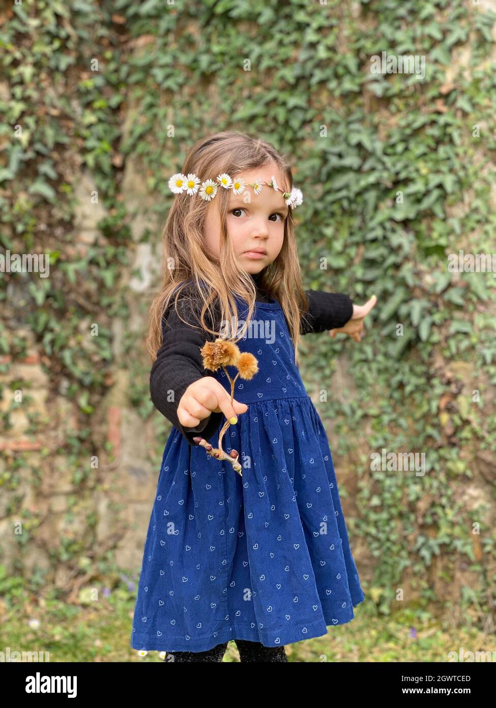 Girl 4 5 holding rock hi-res stock photography and images - Alamy