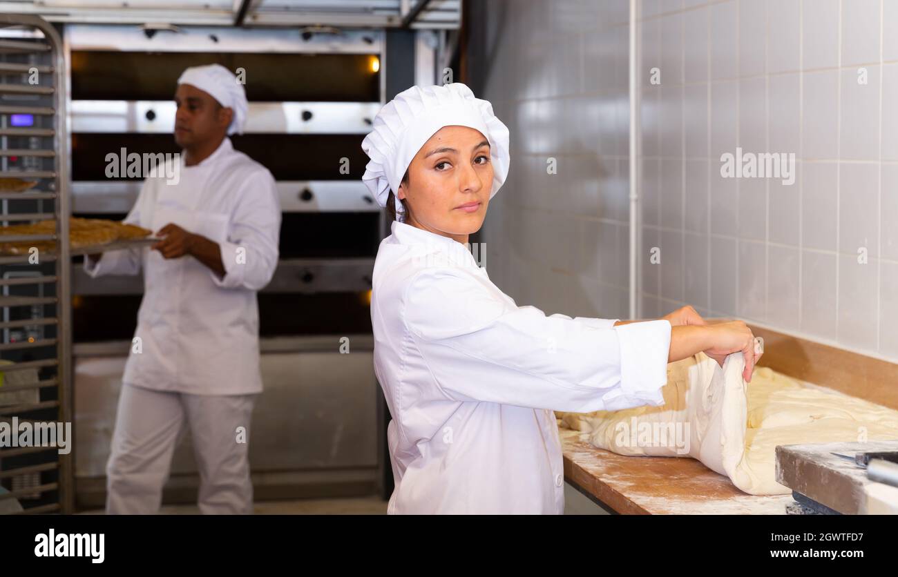 Baker bread young ethnic hi-res stock photography and images - Alamy