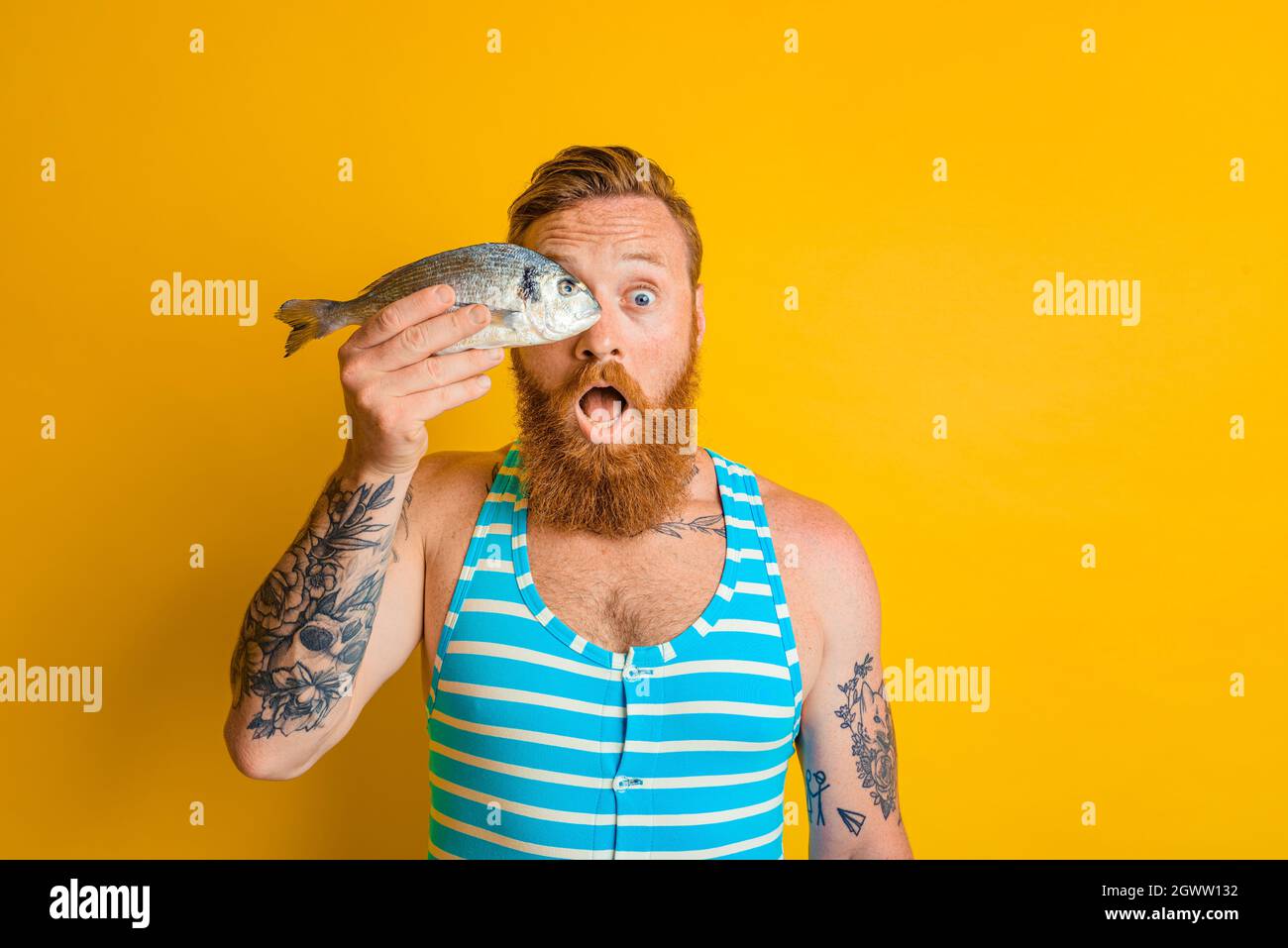 Bearded Man Eating Fish
