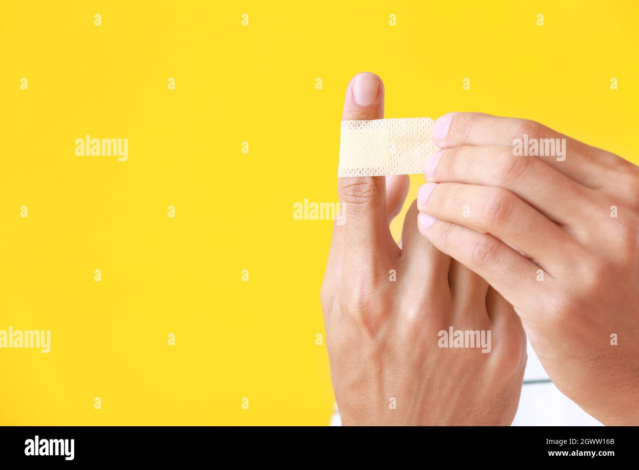 Man plaster finger hi-res stock photography and images - Alamy