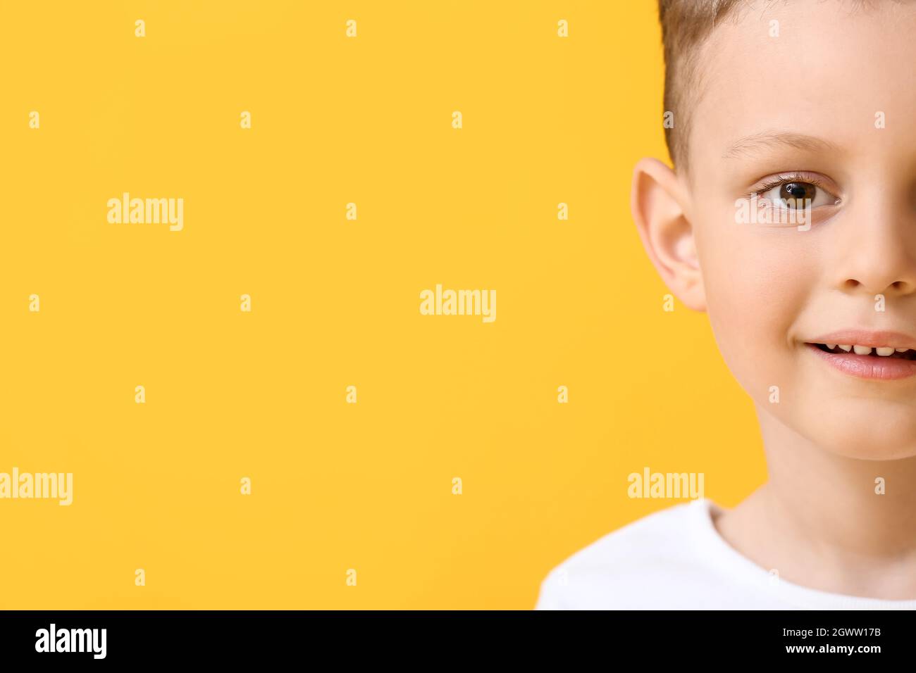 Portrait of happy little boy on color background Stock Photo - Alamy