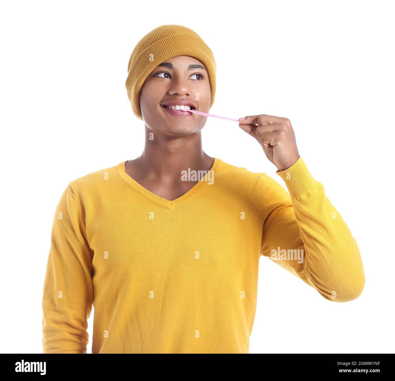 Happy African-American guy with chewing gum on white background Stock ...