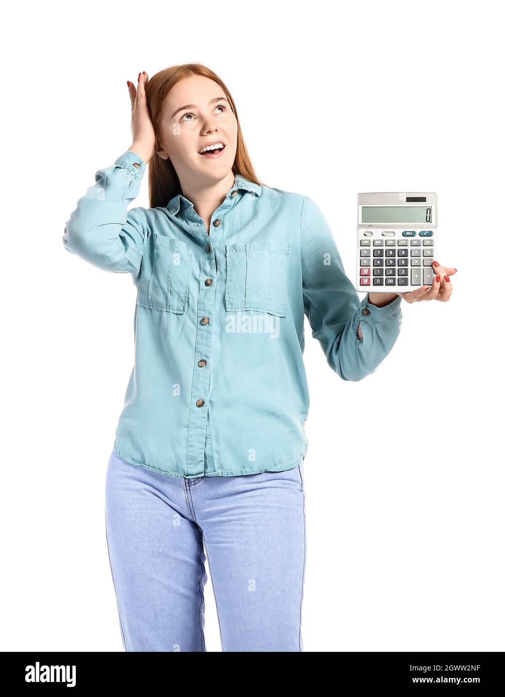 Happy young woman with calculator on white background Stock Photo - Alamy
