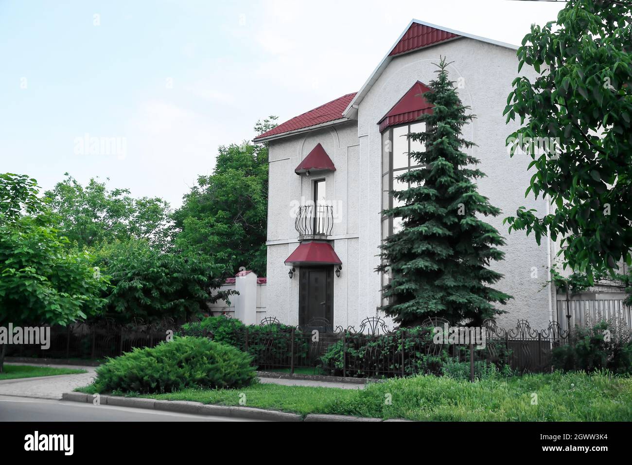 View of modern building and beautiful landscape design Stock Photo - Alamy