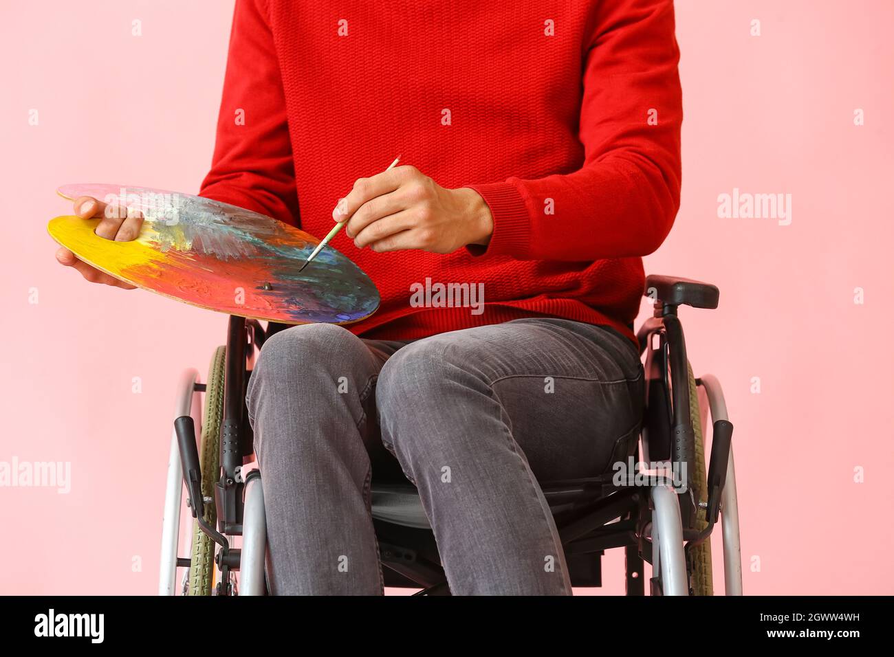 Young handicapped artist drawing hi-res stock photography and images ...