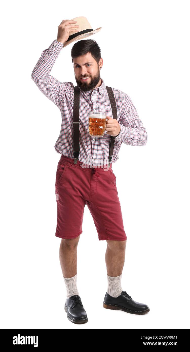 Handsome man in traditional German clothes and with beer on white ...