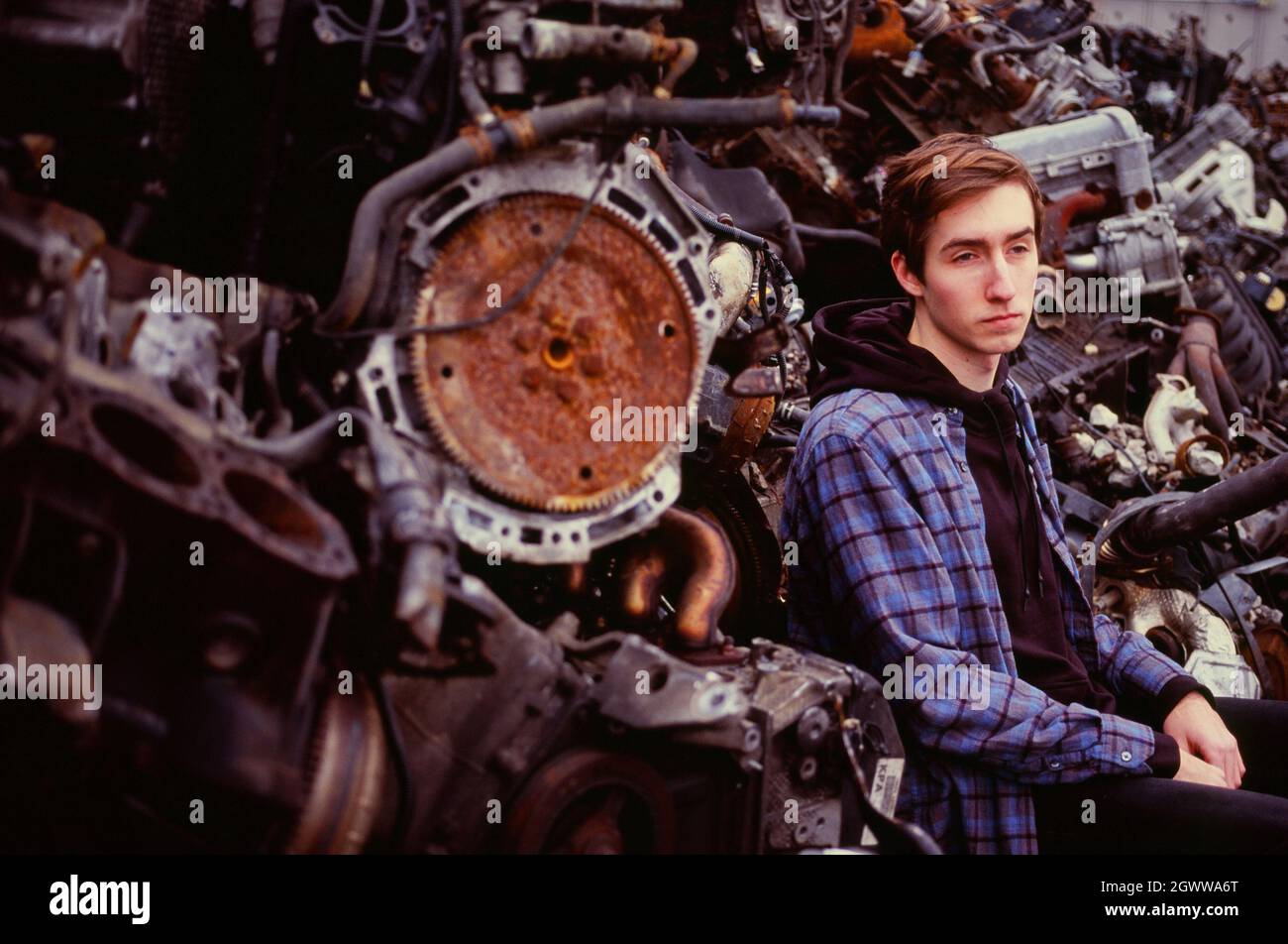Young in junkyard hi-res stock photography and images - Alamy