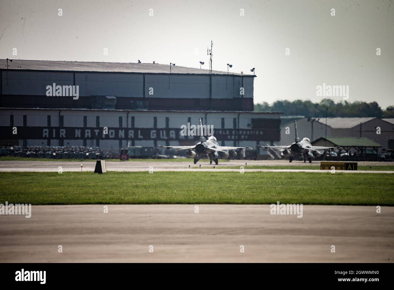 Two F-16 Fighting Falcon aircraft from the 55th Fighter Squadron taxi ...