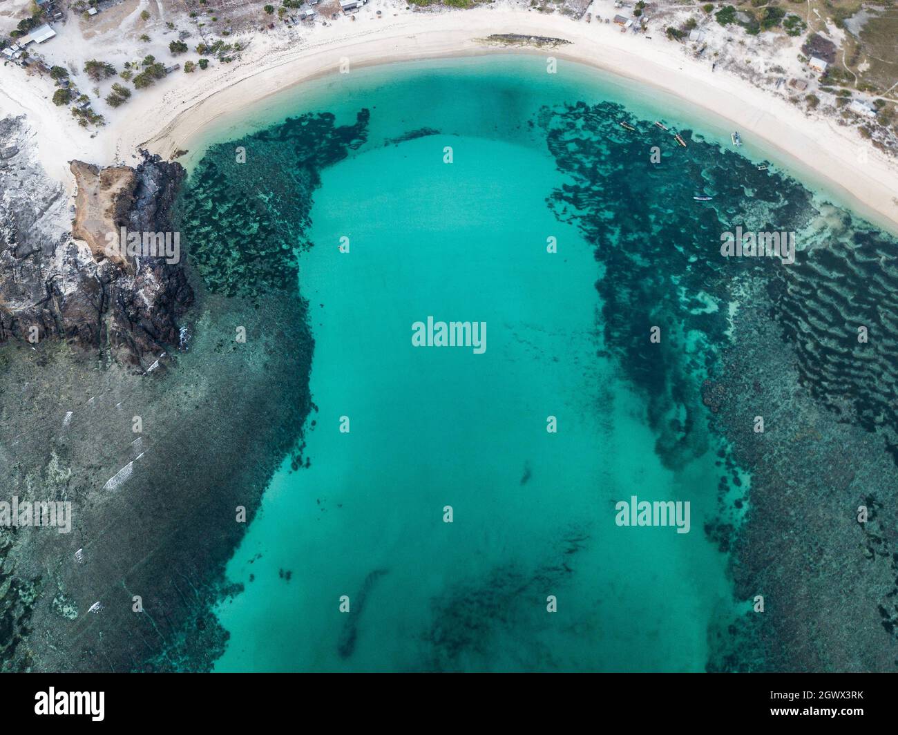 Birds Eye View Of Blue Water Bay Sandy Beach Stock Photo - Alamy