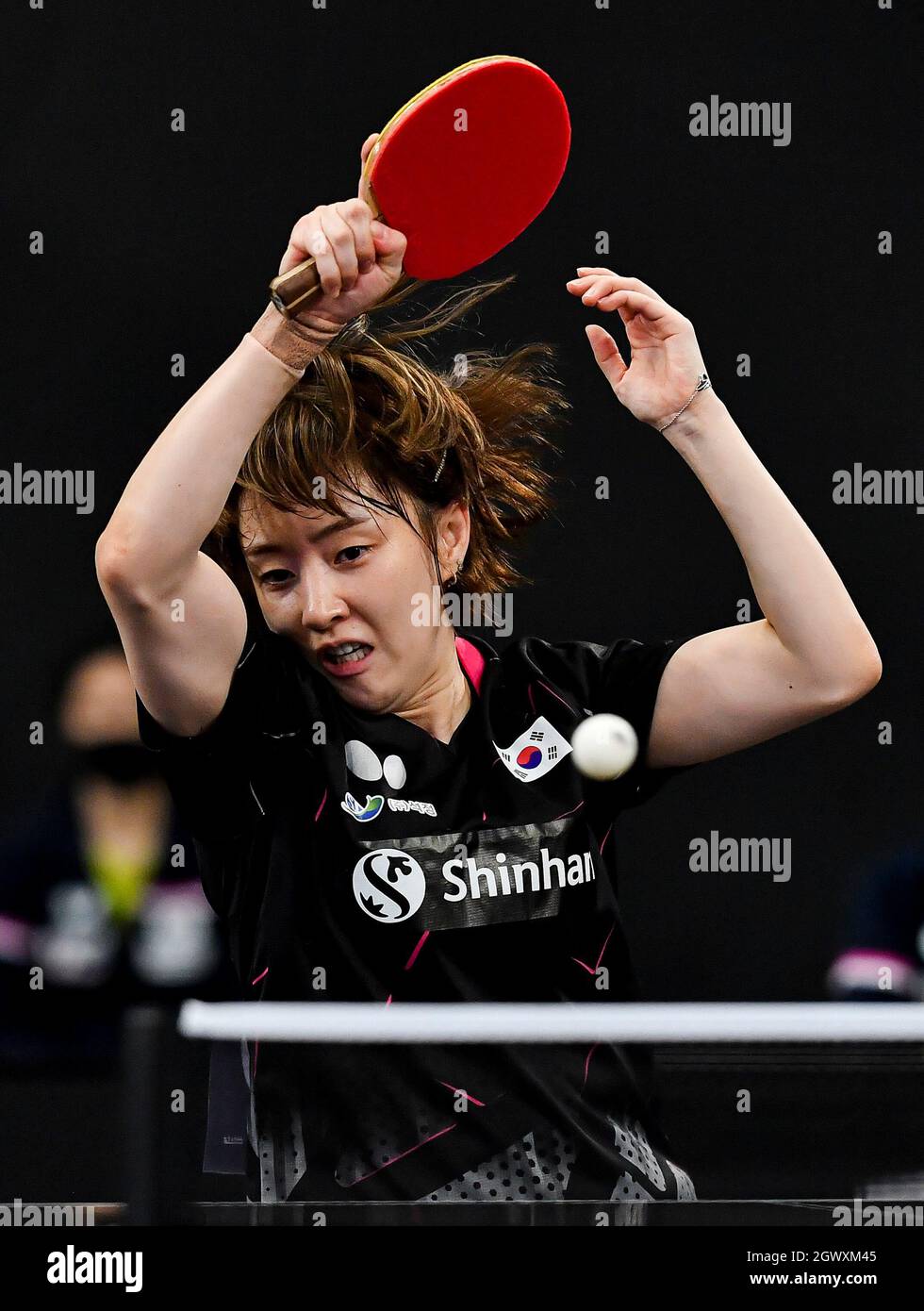 Doha, Qatar. 3rd Oct, 2021. Suh Hyowon of South Korea competes against ...