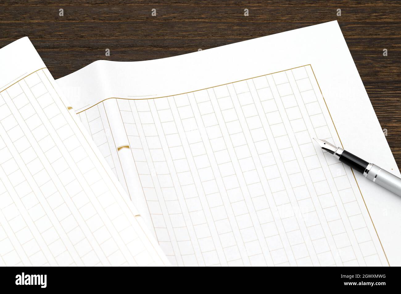 Japanese manuscript paper with fountain pen, Genko yoshi on wooden ...