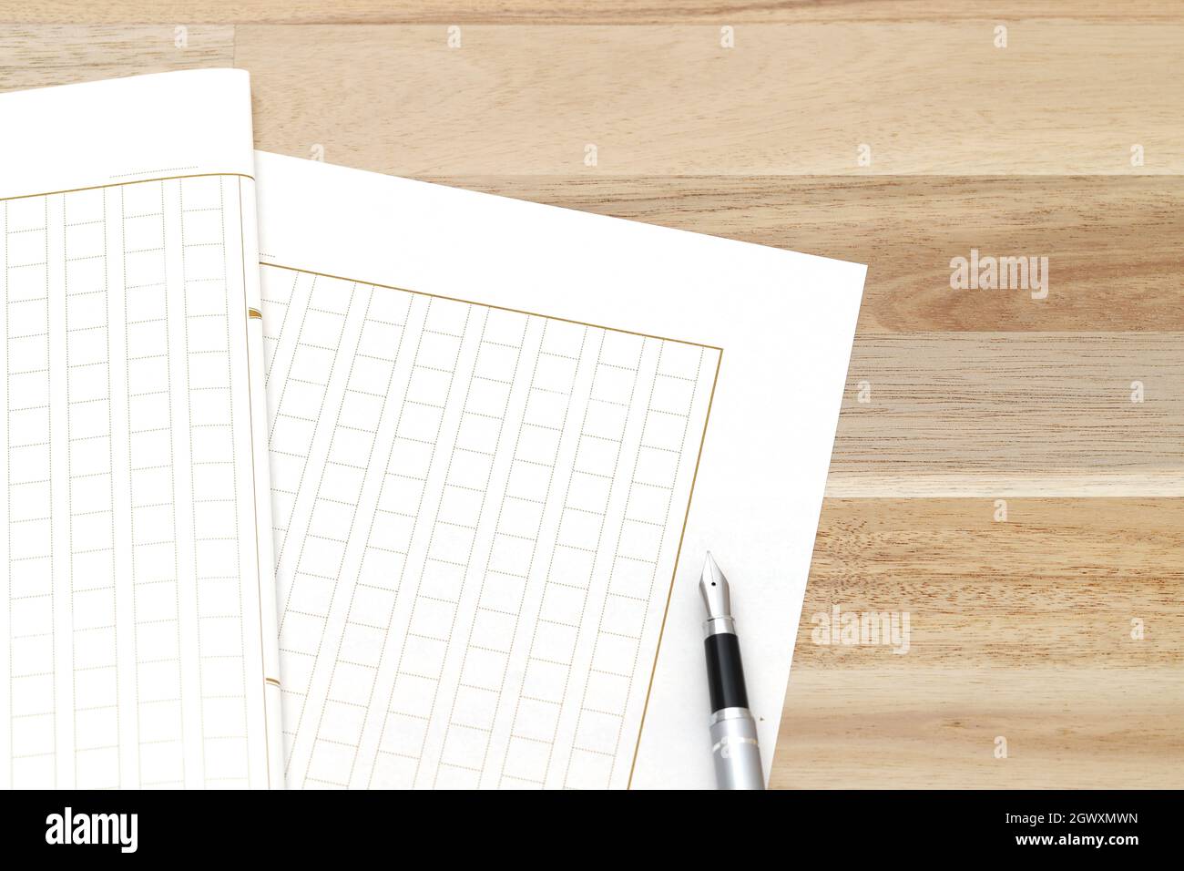 Japanese manuscript paper with fountain pen, Genko yoshi on wooden ...