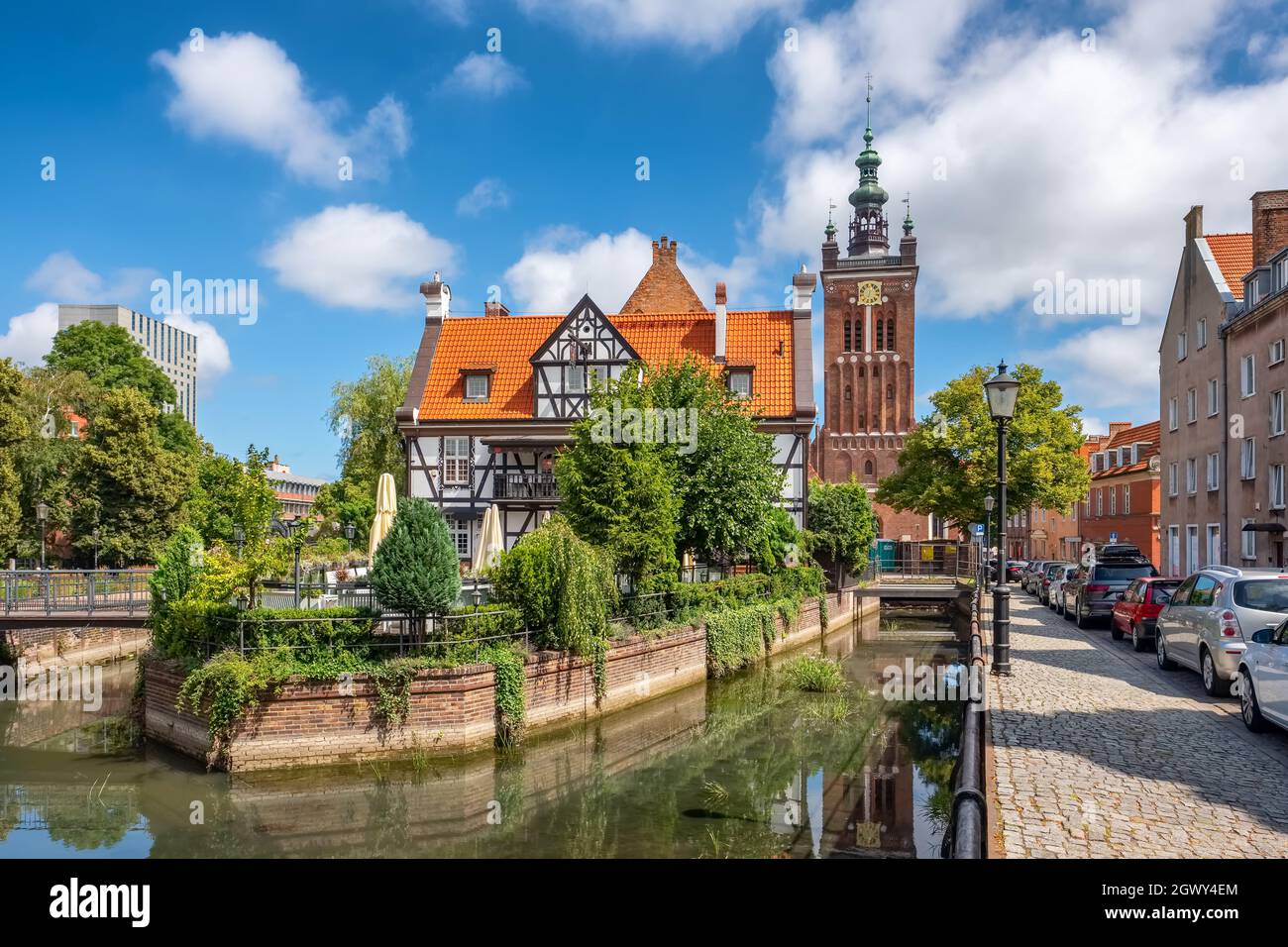 Raduni canal and hanseatic-style Miller's House in the Old Town in ...