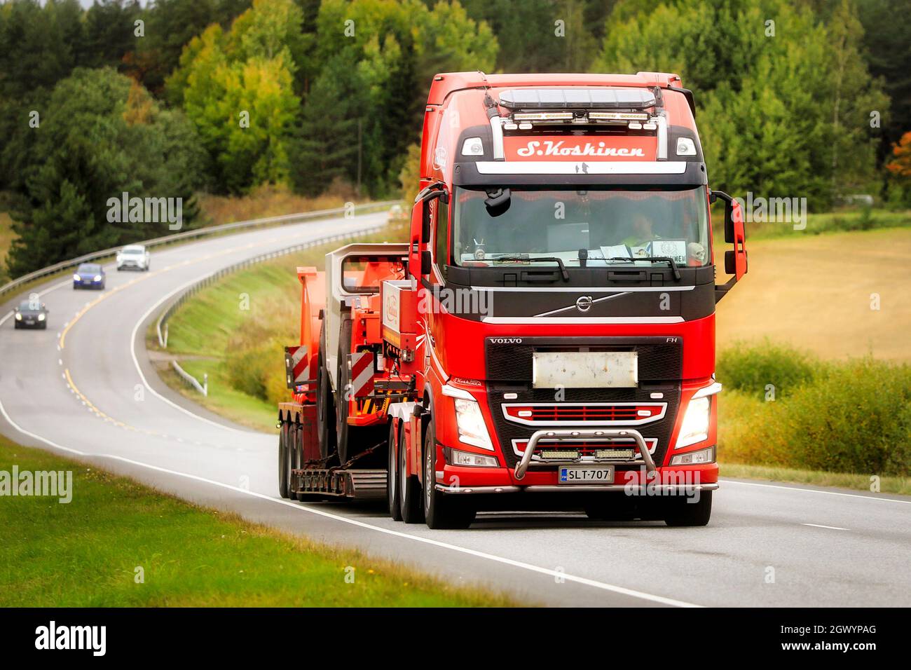Beautiful red Volvo FH semi trailer S Koskinen hauls Sandvik LH410 ...