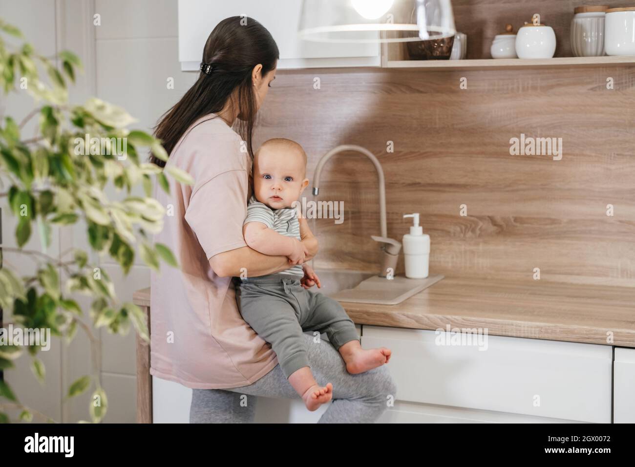 Child and mother doing housework hi-res stock photography and images ...