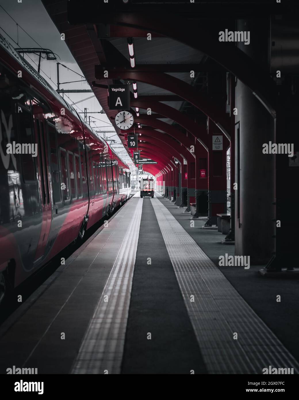 Vertical shot of an empty train station Stock Photo - Alamy