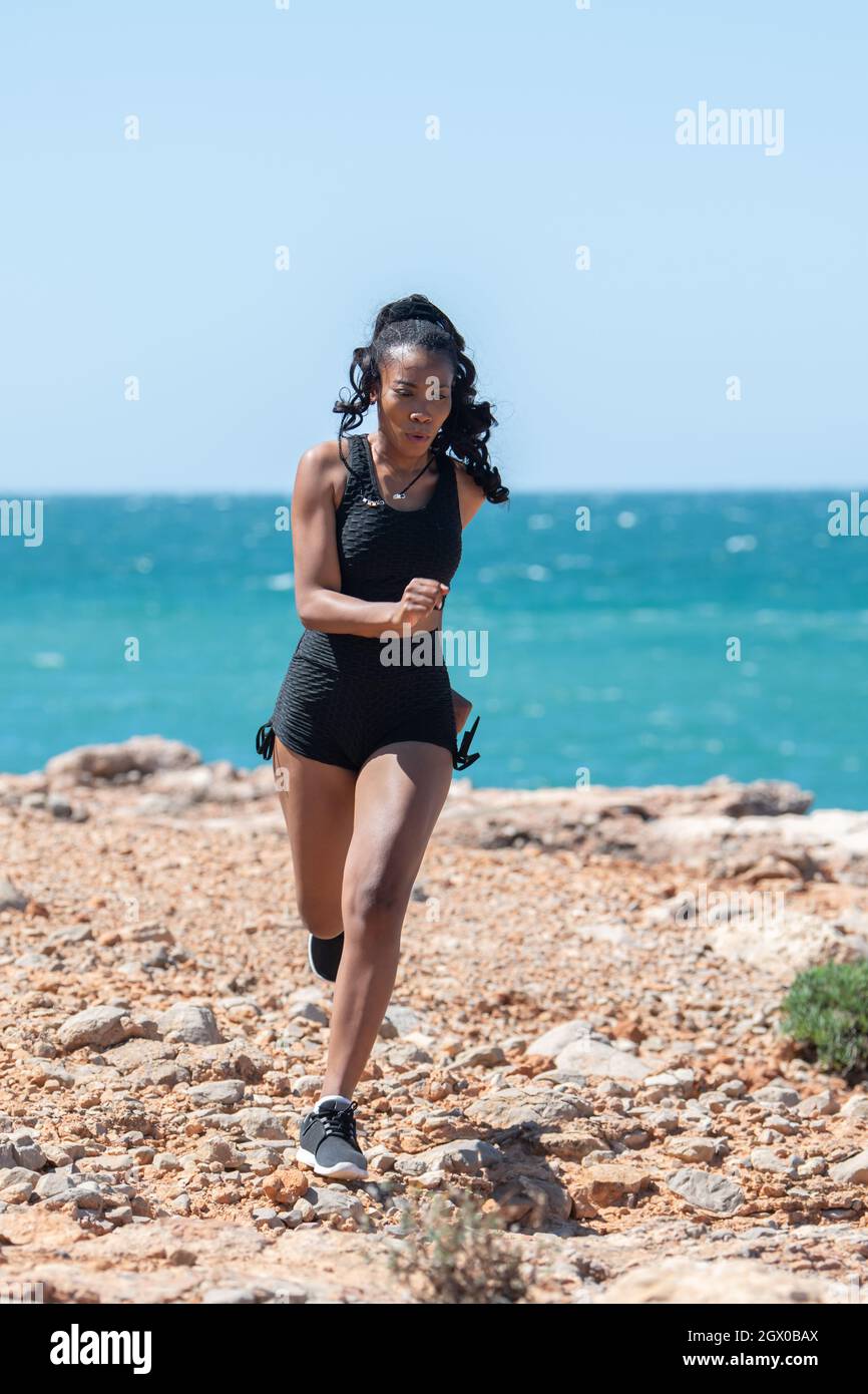 Running towards camera determination hi-res stock photography and ...