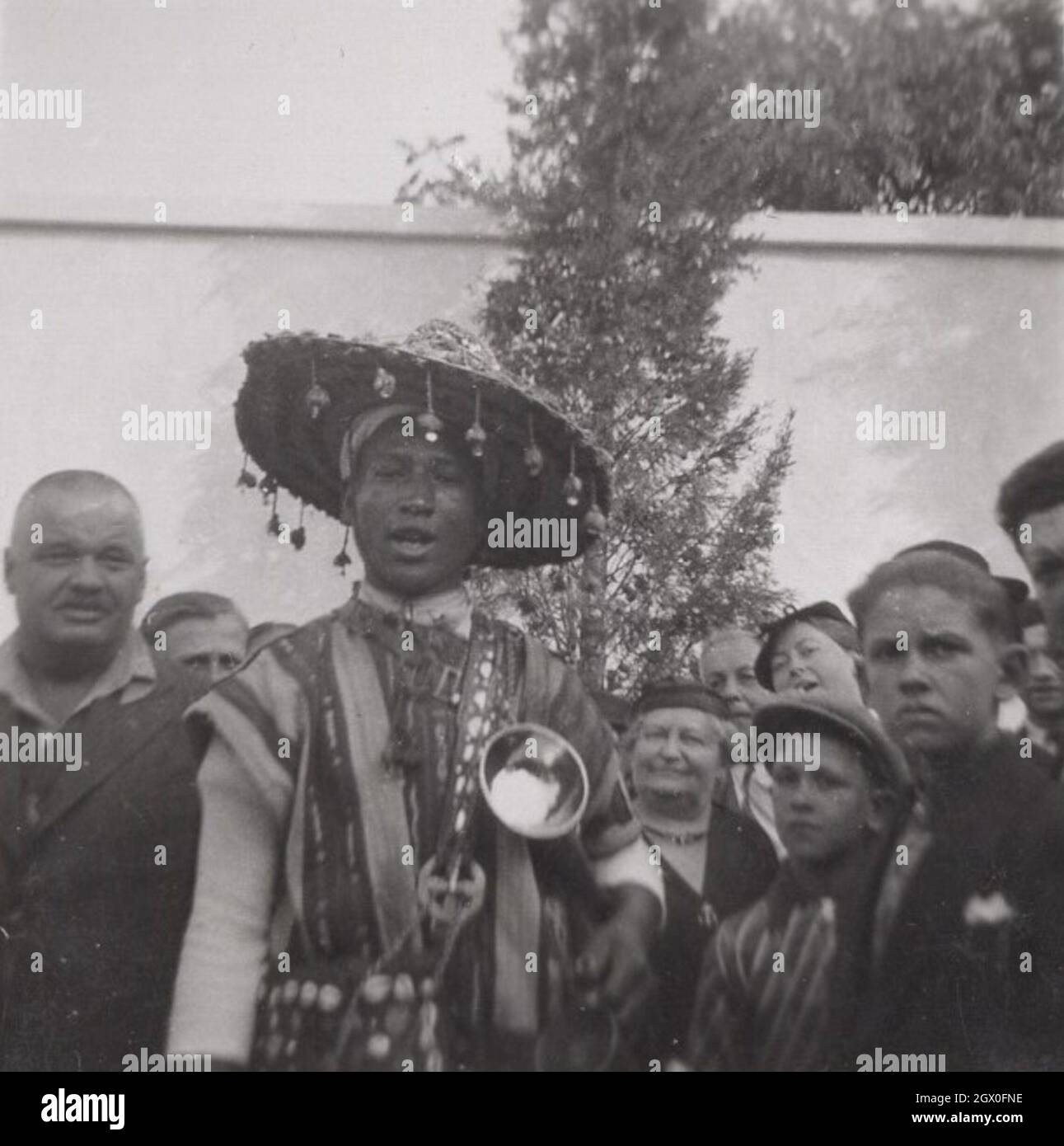 Native american or hispanic singer is singing for the public. The ...