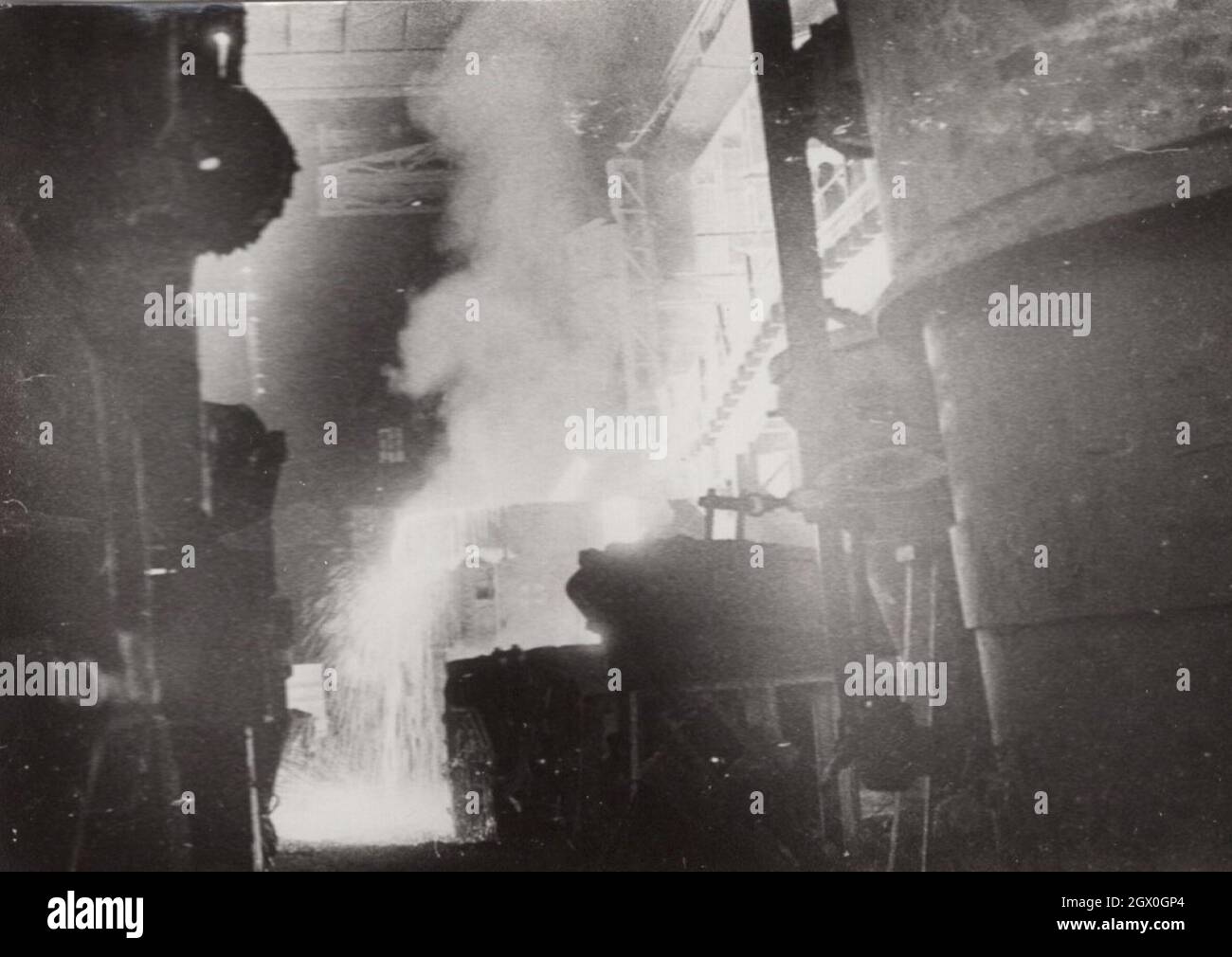 retro monochrome photo about a heavy industry schene possibly steel ...